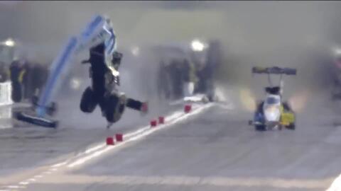 Leah Pruett walks away after Top Fuel dragster crash at Midwest Nationals