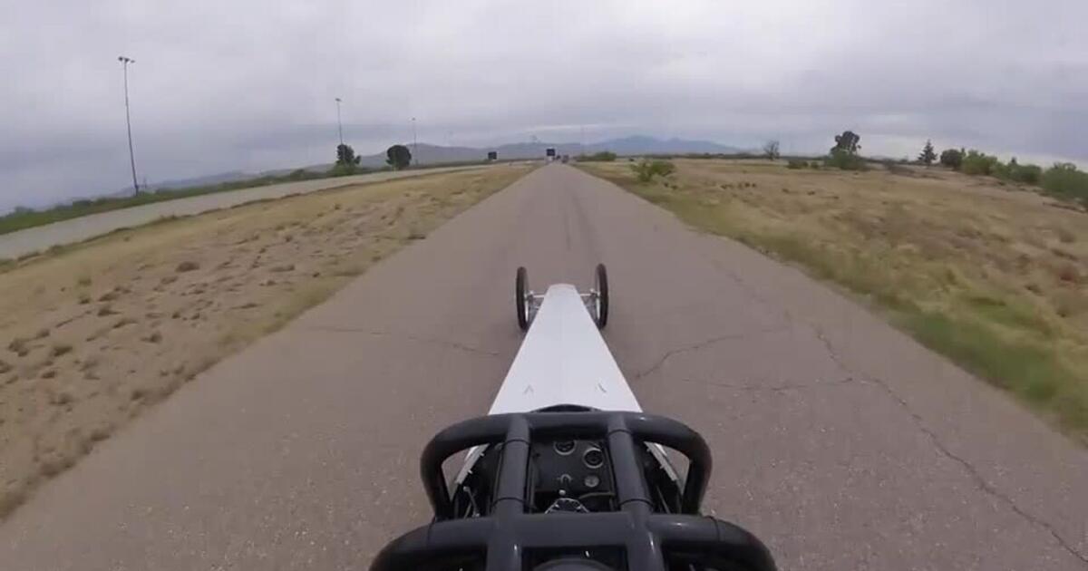 NHRA's Amanda Busick makes a pass in a dragster at the Frank Hawley ...
