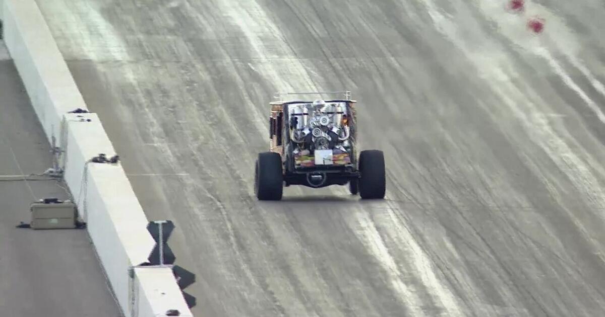 Ed The Outlaw Jones Stagecoach wheelstander put on a show at the Dodge ...