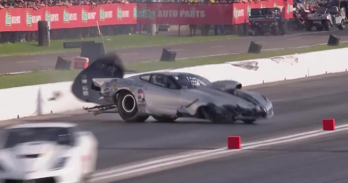 Pro Mod driver Bob Rahaim hits both guardwalls hard in Houston